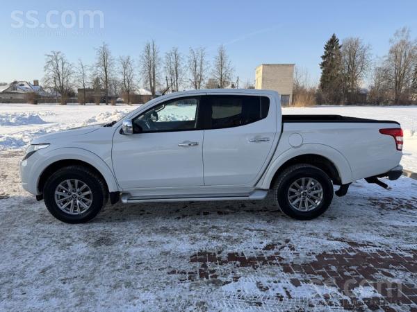 White Mitsubishi l-200 2018 in Jelgava, with an engine capacity of 2.40 L and mileage of 439 thousand km for 15500 €, photo 3 on AUTOMOTO.COM.LV