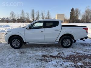White Mitsubishi l-200 2018 in Jelgava, with an engine capacity of 2.40 L and mileage of 439 thousand km for 15500 €, photo 3 on AUTOMOTO.COM.LV