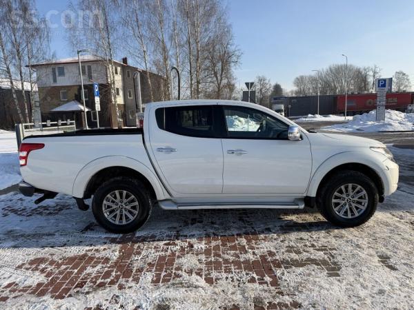 White Mitsubishi l-200 2018 in Jelgava, with an engine capacity of 2.40 L and mileage of 439 thousand km for 15500 €, photo 6 on AUTOMOTO.COM.LV