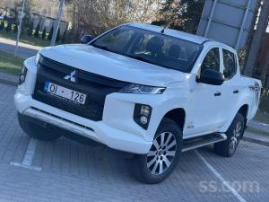 White Mitsubishi l-200 2021 in Jurmala, with an engine capacity of 2.30 L and mileage of 0 thousand km for 26450 €, photo  on AUTOMOTO.COM.LV