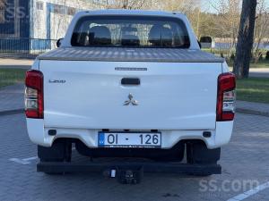 White Mitsubishi l-200 2021 in Jurmala, with an engine capacity of 2.30 L and mileage of 0 thousand km for 26450 €, photo 5 on AUTOMOTO.COM.LV