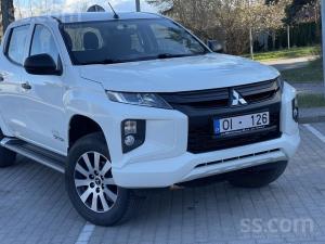White Mitsubishi l-200 2021 in Jurmala, with an engine capacity of 2.30 L and mileage of 0 thousand km for 26450 €, photo 6 on AUTOMOTO.COM.LV