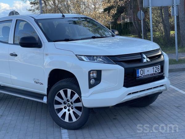White Mitsubishi l-200 2021 in Jurmala, with an engine capacity of 2.30 L and mileage of 0 thousand km for 26450 €, photo 7 on AUTOMOTO.COM.LV