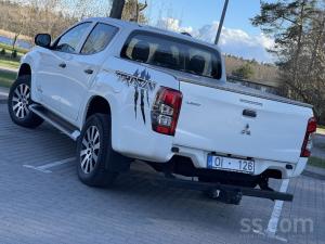 White Mitsubishi l-200 2021 in Jurmala, with an engine capacity of 2.30 L and mileage of 0 thousand km for 26450 €, photo 9 on AUTOMOTO.COM.LV