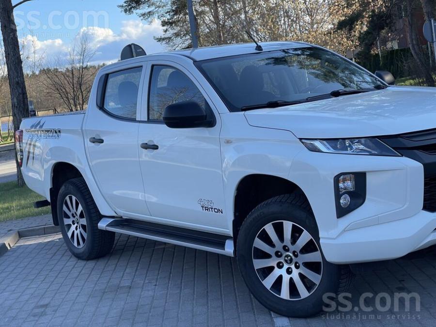 White Mitsubishi l-200 2021 in Jurmala, with an engine capacity of 2.30 L and mileage of 0 thousand km for 26450 €, photo 10 on AUTOMOTO.COM.LV