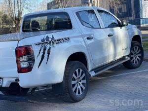 White Mitsubishi l-200 2021 in Jurmala, with an engine capacity of 2.30 L and mileage of 0 thousand km for 26450 €, photo 11 on AUTOMOTO.COM.LV
