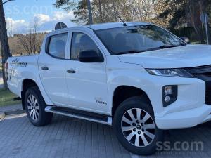 White Mitsubishi l-200 2021 in Jurmala, with an engine capacity of 2.30 L and mileage of 0 thousand km for 26450 €, photo 13 on AUTOMOTO.COM.LV