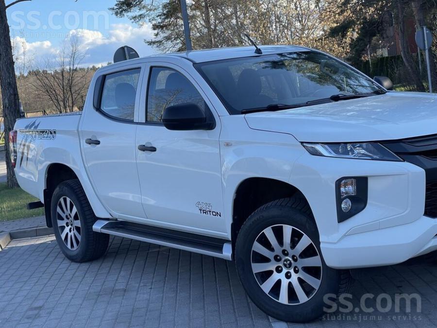 White Mitsubishi l-200 2021 in Jurmala, with an engine capacity of 2.30 L and mileage of 0 thousand km for 26450 €, photo 13 on AUTOMOTO.COM.LV