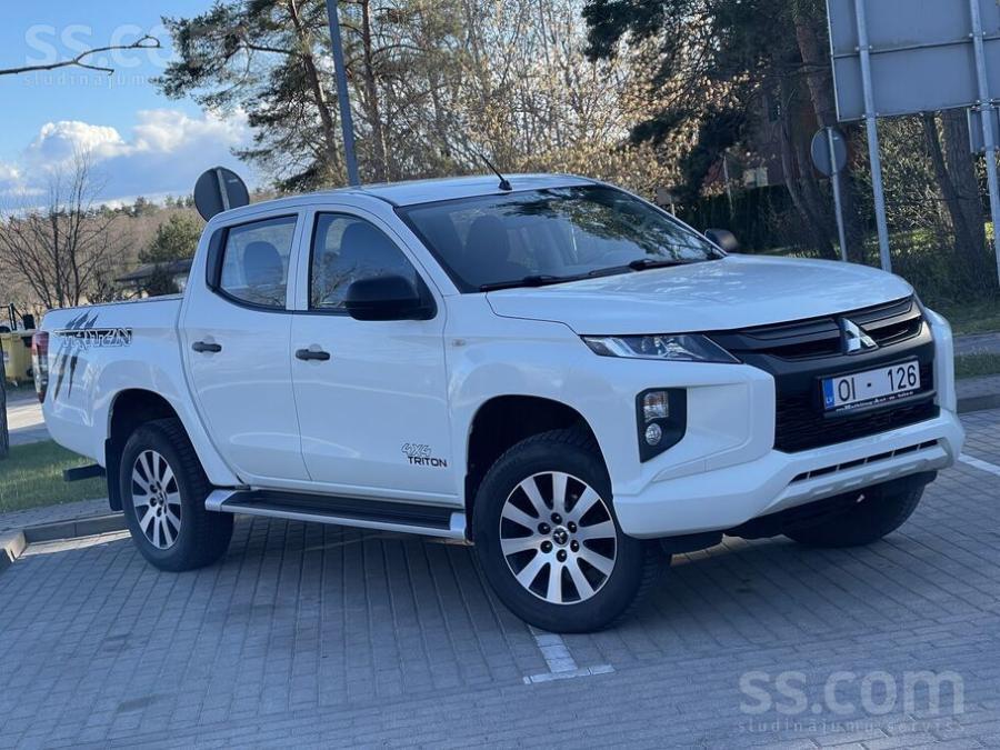 White Mitsubishi l-200 2021 in Jurmala, with an engine capacity of 2.30 L and mileage of 0 thousand km for 26450 €, photo 15 on AUTOMOTO.COM.LV