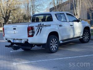 White Mitsubishi l-200 2021 in Jurmala, with an engine capacity of 2.30 L and mileage of 0 thousand km for 26450 €, photo 16 on AUTOMOTO.COM.LV