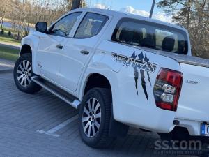 White Mitsubishi l-200 2021 in Jurmala, with an engine capacity of 2.30 L and mileage of 0 thousand km for 26450 €, photo 18 on AUTOMOTO.COM.LV