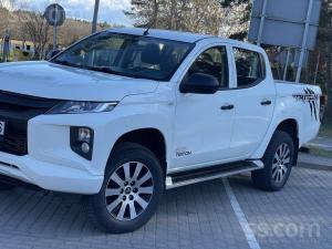 White Mitsubishi l-200 2021 in Jurmala, with an engine capacity of 2.30 L and mileage of 0 thousand km for 26450 €, photo 20 on AUTOMOTO.COM.LV