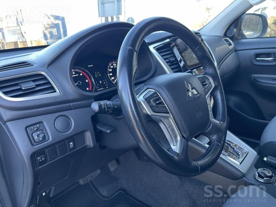 White Mitsubishi l-200 2021 in Jurmala, with an engine capacity of 2.30 L and mileage of 0 thousand km for 26450 €, photo 23 on AUTOMOTO.COM.LV