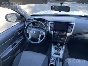 White Mitsubishi l-200 2021 in Jurmala, with an engine capacity of 2.30 L and mileage of 0 thousand km for 26450 €, photo 28 on AUTOMOTO.COM.LV