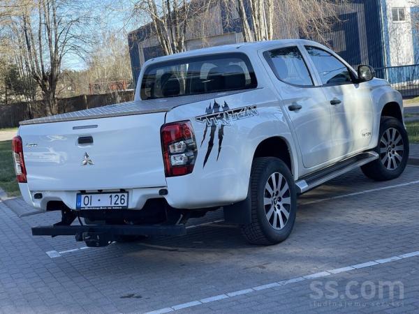 White Mitsubishi l-200 2021 in Jurmala, with an engine capacity of 2.30 L and mileage of 0 thousand km for 26750 €, photo 6 on AUTOMOTO.COM.LV