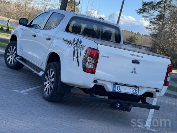 White Mitsubishi l-200 2021 in Jurmala, with an engine capacity of 2.30 L and mileage of 0 thousand km for 26750 €, photo 8 on AUTOMOTO.COM.LV