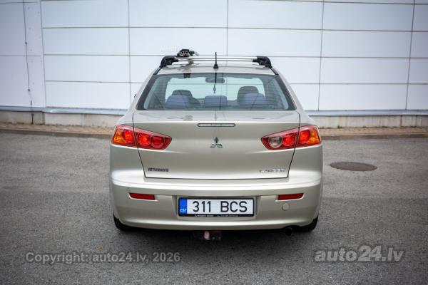 Beige Mitsubishi Lancer 2010 in Tallinn, with an engine capacity of 2.00 L and mileage of 280 thousand km for 4200 €, photo 7 on AUTOMOTO.COM.LV