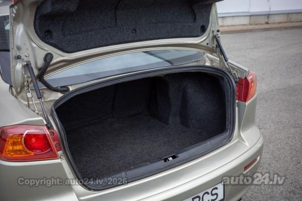 Beige Mitsubishi Lancer 2010 in Tallinn, with an engine capacity of 2.00 L and mileage of 280 thousand km for 4200 €, photo 10 on AUTOMOTO.COM.LV
