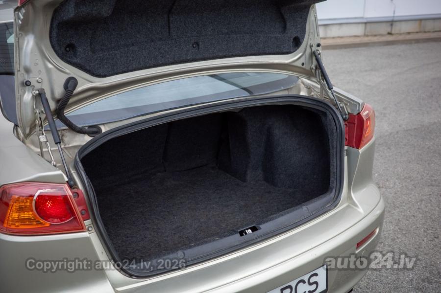 Smilšu krāsa Mitsubishi Lancer 2010 Tallina, ar dzinēja tilpumu 2.00 L un nobraukumu 280 tūkst. km par 4200 €, foto 11 vietnē AUTOMOTO.COM.LV
