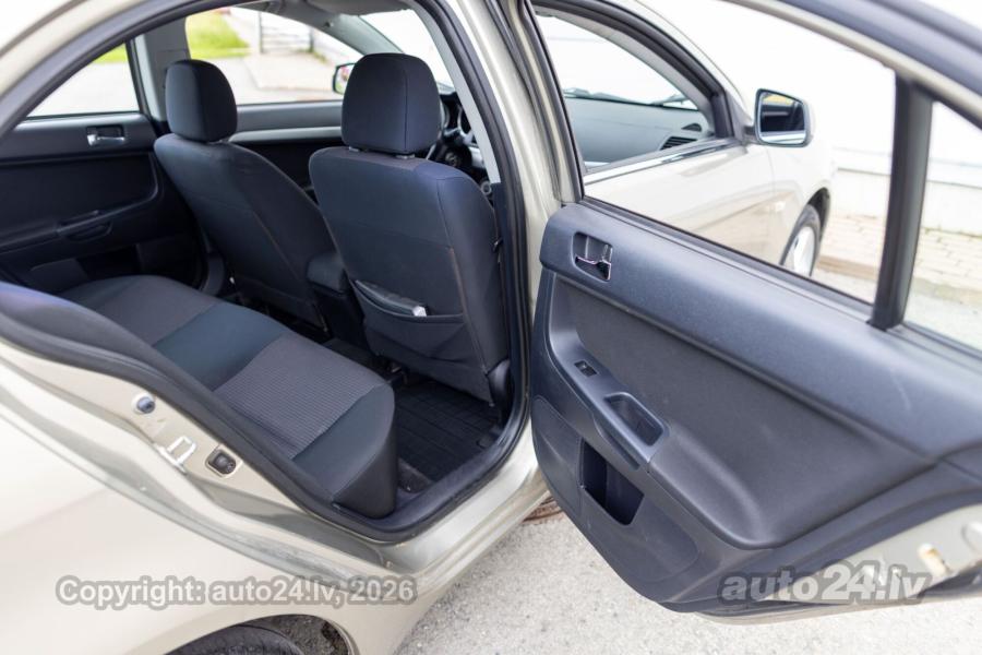 Smilšu krāsa Mitsubishi Lancer 2010 Tallina, ar dzinēja tilpumu 2.00 L un nobraukumu 280 tūkst. km par 4200 €, foto 18 vietnē AUTOMOTO.COM.LV