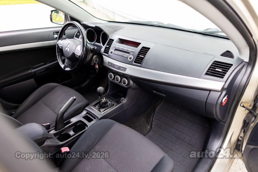 Smilšu krāsa Mitsubishi Lancer 2010 Tallina, ar dzinēja tilpumu 2.00 L un nobraukumu 280 tūkst. km par 4200 €, foto 21 vietnē AUTOMOTO.COM.LV