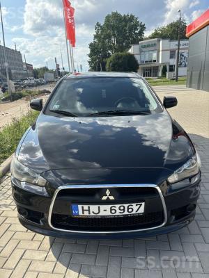 Black Mitsubishi Lancer 2009 in Riga, with an engine capacity of 1.80 L and mileage of 96 thousand km for 5200 €, photo 2 on AUTOMOTO.COM.LV