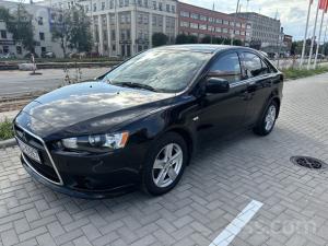 Black Mitsubishi Lancer 2009 in Riga, with an engine capacity of 1.80 L and mileage of 96 thousand km for 5200 €, photo 3 on AUTOMOTO.COM.LV