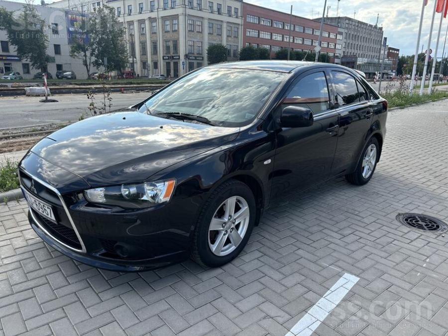 Black Mitsubishi Lancer 2009 in Riga, with an engine capacity of 1.80 L and mileage of 96 thousand km for 5200 €, photo 3 on AUTOMOTO.COM.LV