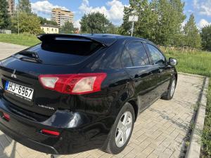 Black Mitsubishi Lancer 2009 in Riga, with an engine capacity of 1.80 L and mileage of 96 thousand km for 5200 €, photo 20 on AUTOMOTO.COM.LV