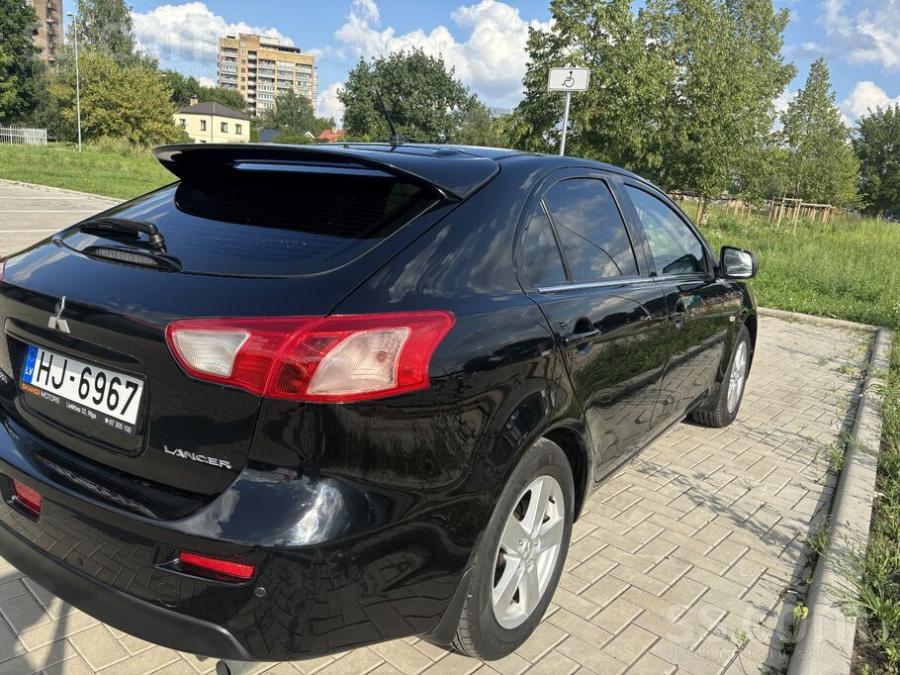 Black Mitsubishi Lancer 2009 in Riga, with an engine capacity of 1.80 L and mileage of 96 thousand km for 5200 €, photo 20 on AUTOMOTO.COM.LV