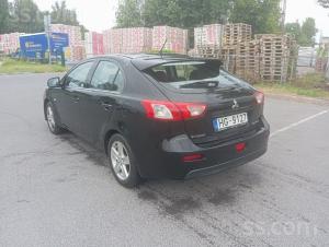 Black Mitsubishi Lancer 2009 in Riga, with an engine capacity of 1.80 L and mileage of 231 thousand km for 1000 €, photo 3 on AUTOMOTO.COM.LV