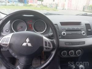 Black Mitsubishi Lancer 2009 in Riga, with an engine capacity of 1.80 L and mileage of 231 thousand km for 1000 €, photo 6 on AUTOMOTO.COM.LV
