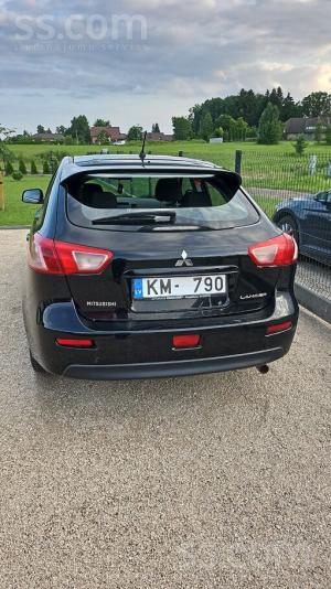 Black Mitsubishi Lancer 2009 in Aizkraukle, with an engine capacity of 2.00 L and mileage of 300 thousand km for 2300 €, photo 12 on AUTOMOTO.COM.LV