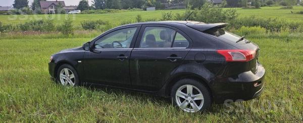 Melns Mitsubishi Lancer 2009 Aizkraukle, ar dzinēja tilpumu 2.00 L un nobraukumu 300 tūkst. km par 1700 €, foto 1 vietnē AUTOMOTO.COM.LV