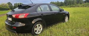 Black Mitsubishi Lancer 2009 in Aizkraukle, with an engine capacity of 2.00 L and mileage of 300 thousand km for 1700 €, photo 4 on AUTOMOTO.COM.LV