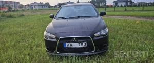 Black Mitsubishi Lancer 2009 in Aizkraukle, with an engine capacity of 2.00 L and mileage of 300 thousand km for 1700 €, photo 5 on AUTOMOTO.COM.LV