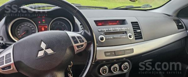 Melns Mitsubishi Lancer 2009 Aizkraukle, ar dzinēja tilpumu 2.00 L un nobraukumu 300 tūkst. km par 1700 €, foto 5 vietnē AUTOMOTO.COM.LV