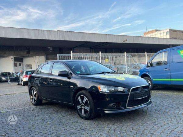 Melns Mitsubishi Lancer 2010 Prienai, ar dzinēja tilpumu 1.50 L un nobraukumu 249 tūkst. km par 2888 €, foto 1 vietnē AUTOMOTO.COM.LV