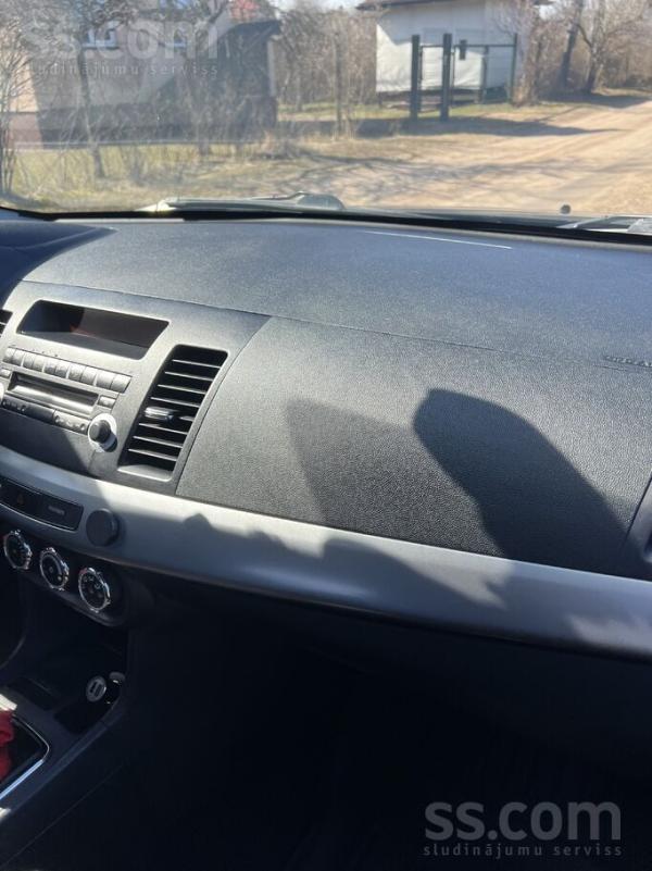 Melns Mitsubishi Lancer 2011 Rīga, ar dzinēja tilpumu 1.80 L un nobraukumu 205 tūkst. km par 3850 €, foto 8 vietnē AUTOMOTO.COM.LV