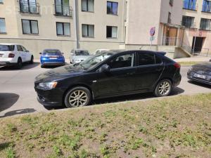 Black Mitsubishi Lancer 2011 in Riga, with an engine capacity of 1.80 L and mileage of 380 thousand km for 3800 €, photo  on AUTOMOTO.COM.LV