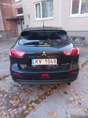 Melns Mitsubishi Lancer 2011 Rīga, ar dzinēja tilpumu 1.80 L un nobraukumu 380 tūkst. km par 3800 €, foto 3 vietnē AUTOMOTO.COM.LV