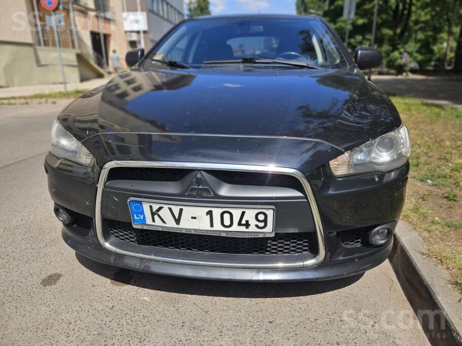 Melns Mitsubishi Lancer 2011 Rīga, ar dzinēja tilpumu 1.80 L un nobraukumu 380 tūkst. km par 3800 €, foto 4 vietnē AUTOMOTO.COM.LV
