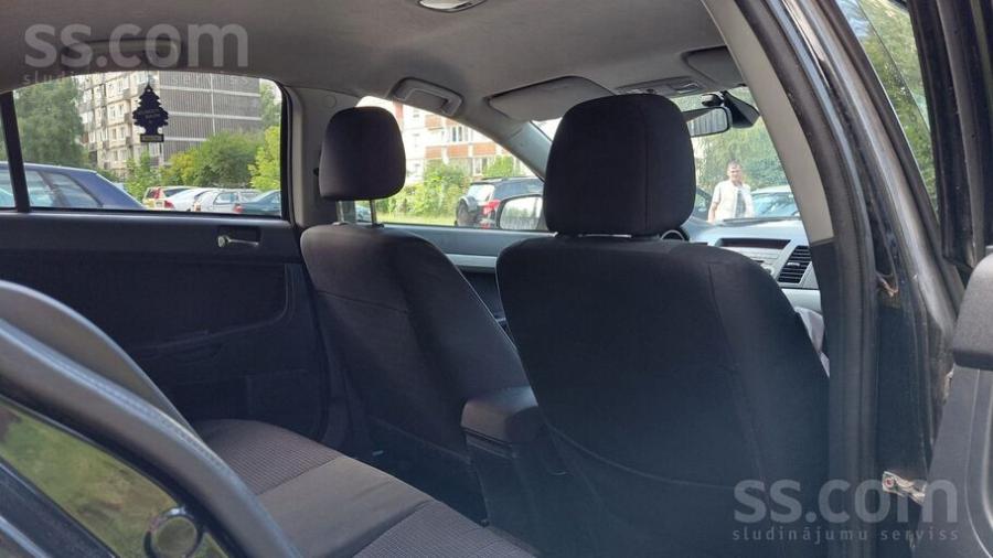 Melns Mitsubishi Lancer 2011 Rīga, ar dzinēja tilpumu 1.80 L un nobraukumu 380 tūkst. km par 3800 €, foto 7 vietnē AUTOMOTO.COM.LV