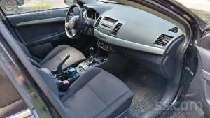 Melns Mitsubishi Lancer 2011 Rīga, ar dzinēja tilpumu 1.80 L un nobraukumu 380 tūkst. km par 3800 €, foto 9 vietnē AUTOMOTO.COM.LV