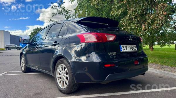 Melns Mitsubishi Lancer 2011 Rīga, ar dzinēja tilpumu 1.80 L un nobraukumu 380 tūkst. km par 3600 €, foto 3 vietnē AUTOMOTO.COM.LV