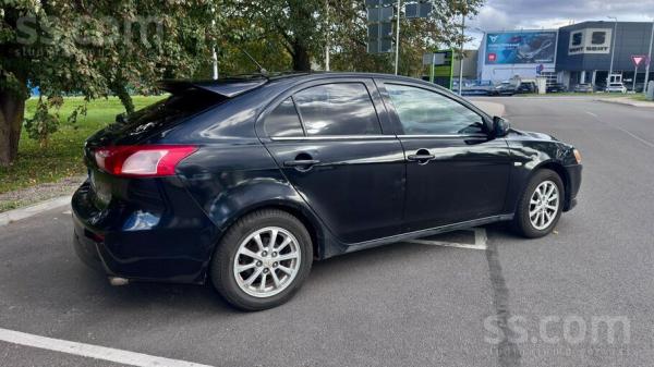 Melns Mitsubishi Lancer 2011 Rīga, ar dzinēja tilpumu 1.80 L un nobraukumu 380 tūkst. km par 3600 €, foto 4 vietnē AUTOMOTO.COM.LV
