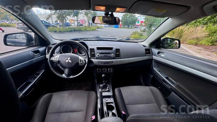 Melns Mitsubishi Lancer 2011 Rīga, ar dzinēja tilpumu 1.80 L un nobraukumu 380 tūkst. km par 3600 €, foto 5 vietnē AUTOMOTO.COM.LV