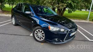 Melns Mitsubishi Lancer 2011 Rīga, ar dzinēja tilpumu 1.80 L un nobraukumu 380 tūkst. km par 3600 €, foto 6 vietnē AUTOMOTO.COM.LV