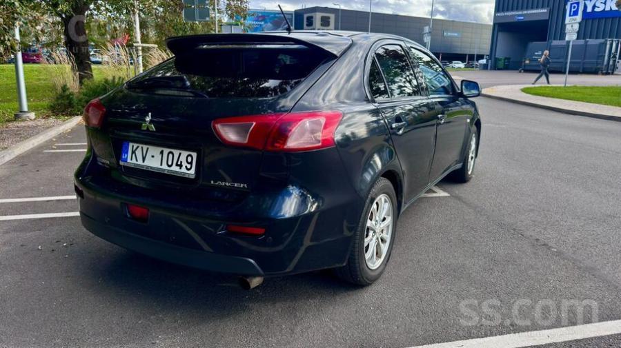 Melns Mitsubishi Lancer 2011 Rīga, ar dzinēja tilpumu 1.80 L un nobraukumu 380 tūkst. km par 3600 €, foto 7 vietnē AUTOMOTO.COM.LV