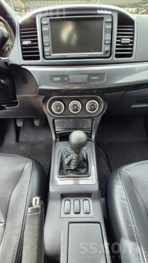 Melns Mitsubishi Lancer 2011 Rīga, ar dzinēja tilpumu 2.00 L un nobraukumu 244 tūkst. km par 4200 €, foto 5 vietnē AUTOMOTO.COM.LV